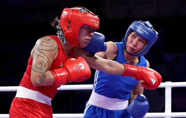 Vietnamese female boxer advances to 2nd qualification round at Paris ...
