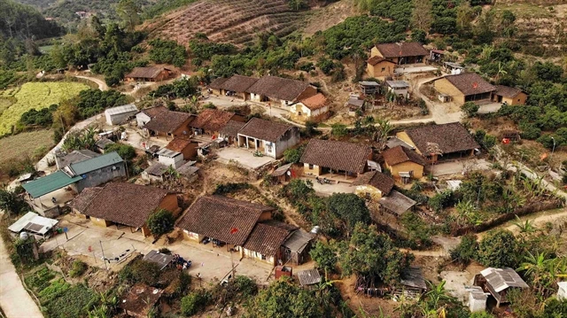 Nung ethnic hamlet attracts tourists with traditional rammed earth ...